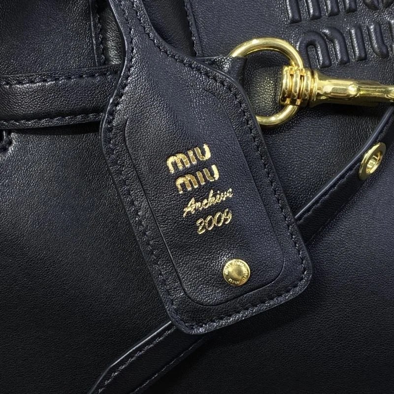 Top mirror Miu Miu Top Handle Bags