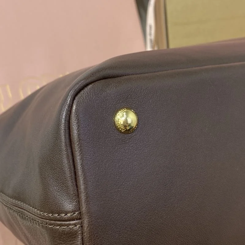 Value-priced Miu Miu Top Handle Bags