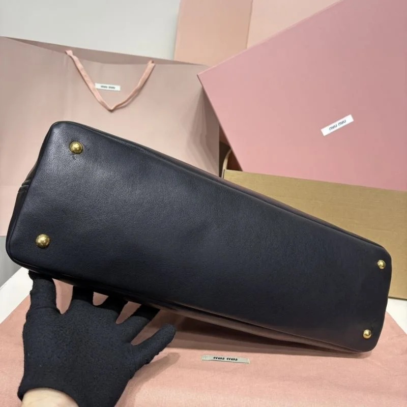 Top mirror Miu Miu Top Handle Bags