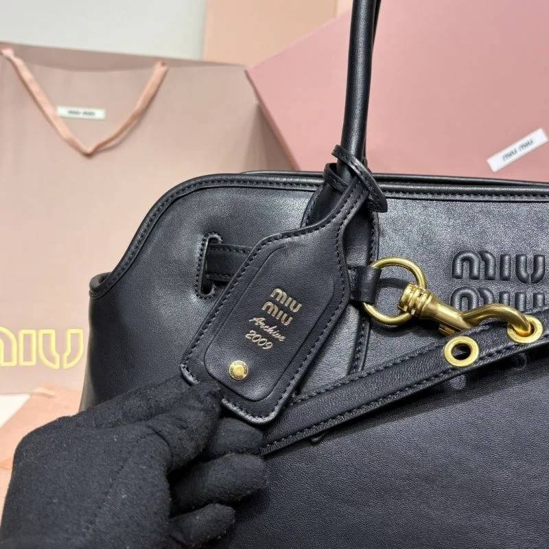 Top mirror Miu Miu Top Handle Bags