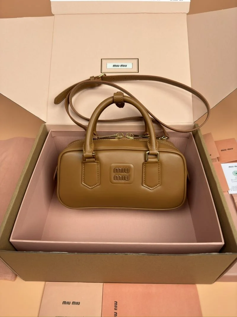 Budget-friendly Miu Miu Top Handle Bags