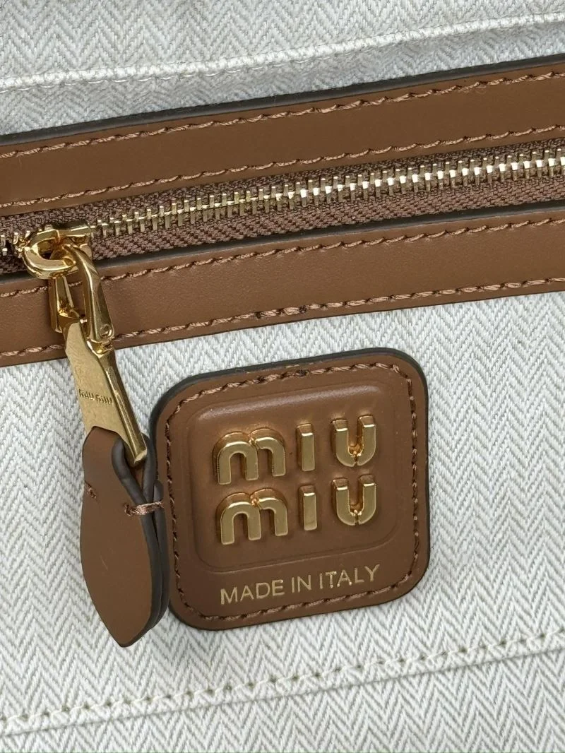 Brand-authenticated Miu Miu Top Handle Bags