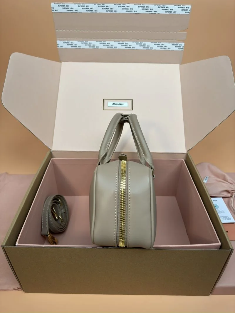 Value-priced Miu Miu Top Handle Bags