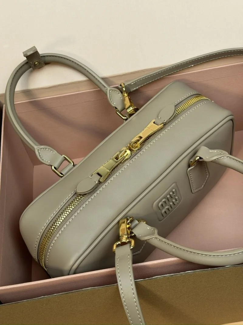 Value-priced Miu Miu Top Handle Bags