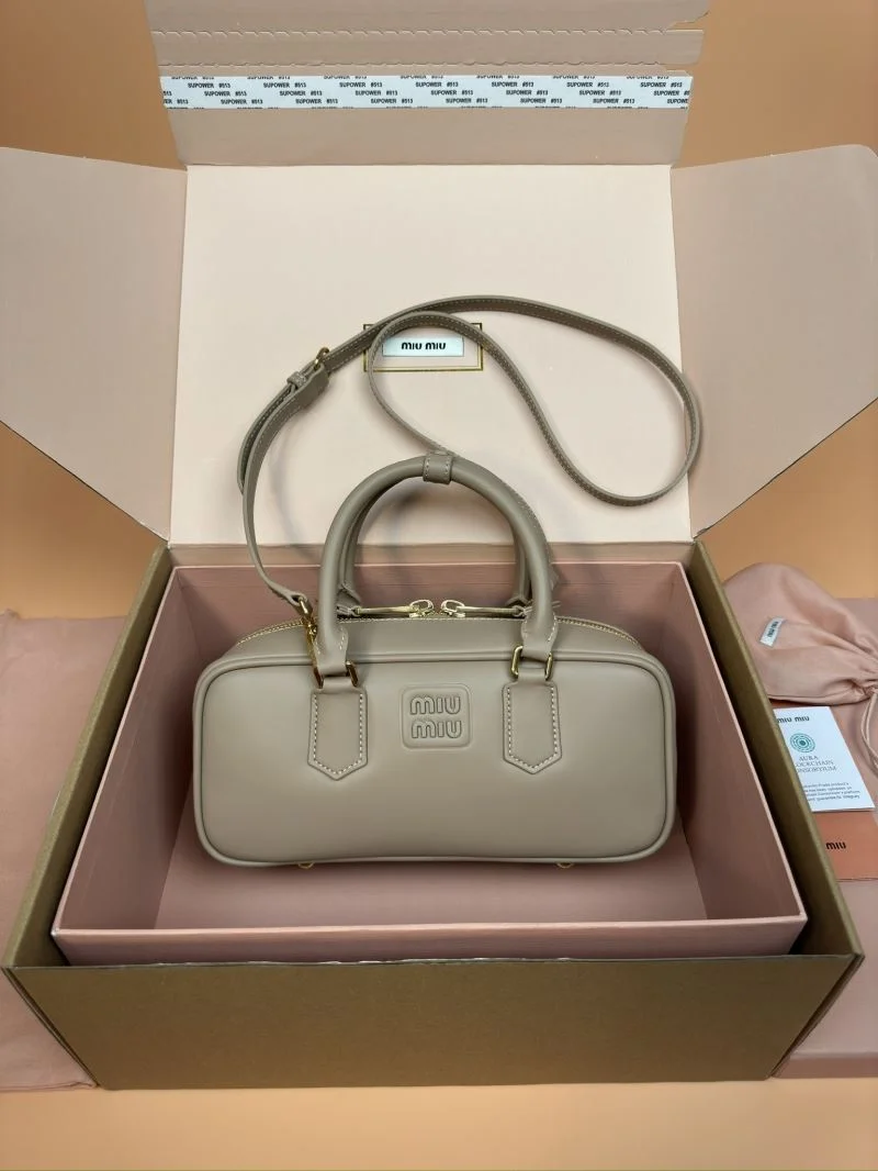 Value-priced Miu Miu Top Handle Bags
