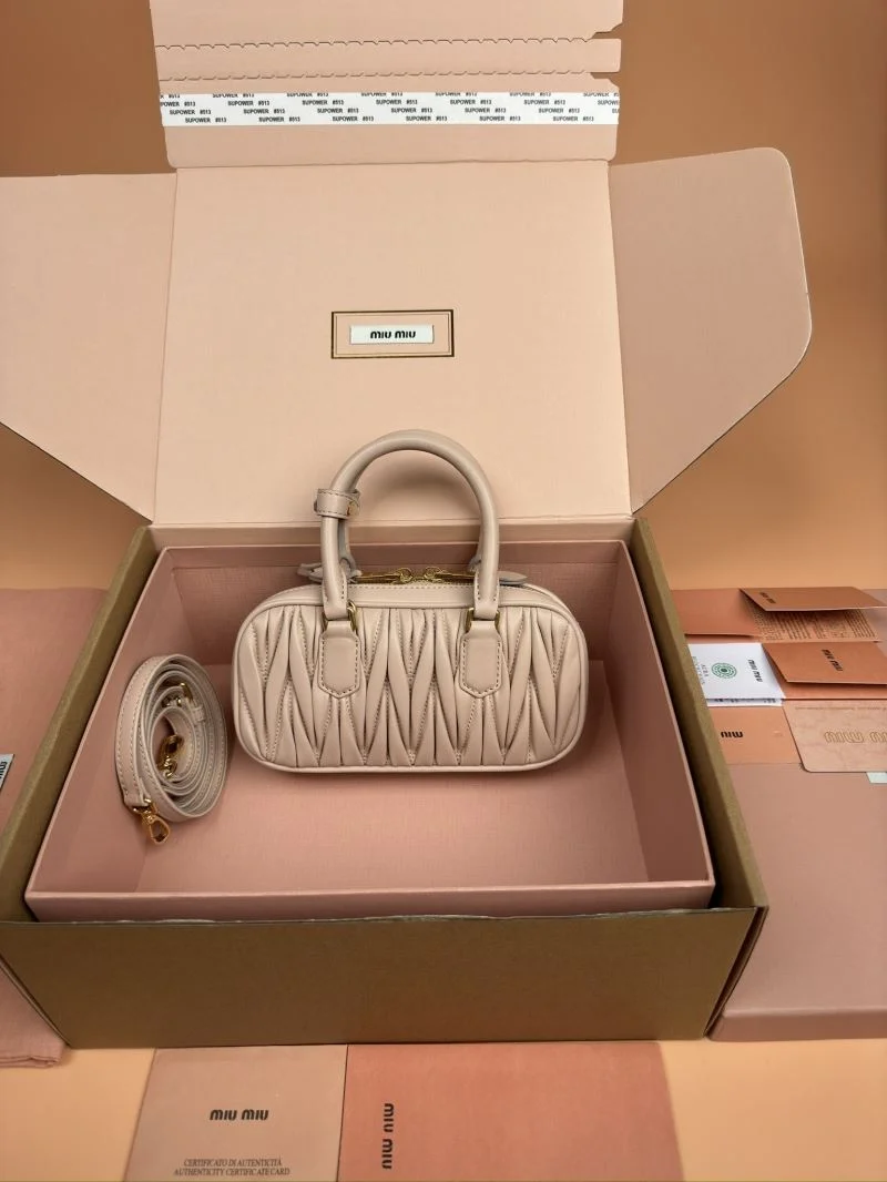 Value-priced Miu Miu Top Handle Bags