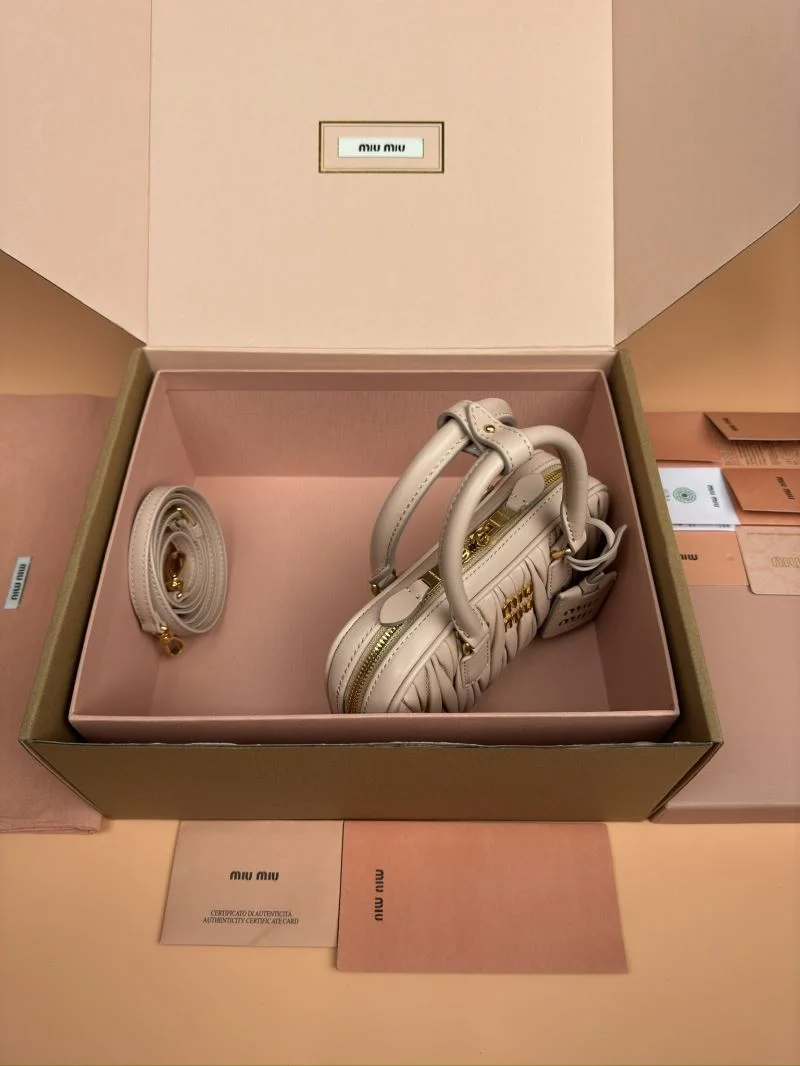 Value-priced Miu Miu Top Handle Bags