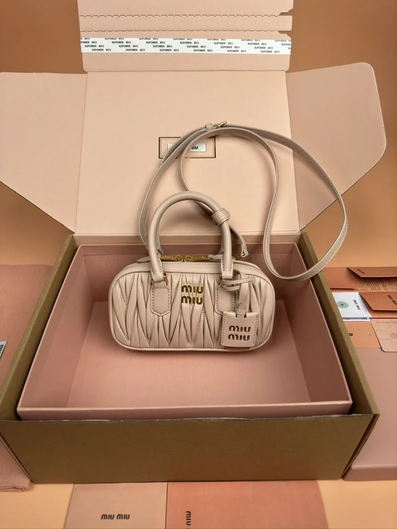 Value-priced Miu Miu Top Handle Bags
