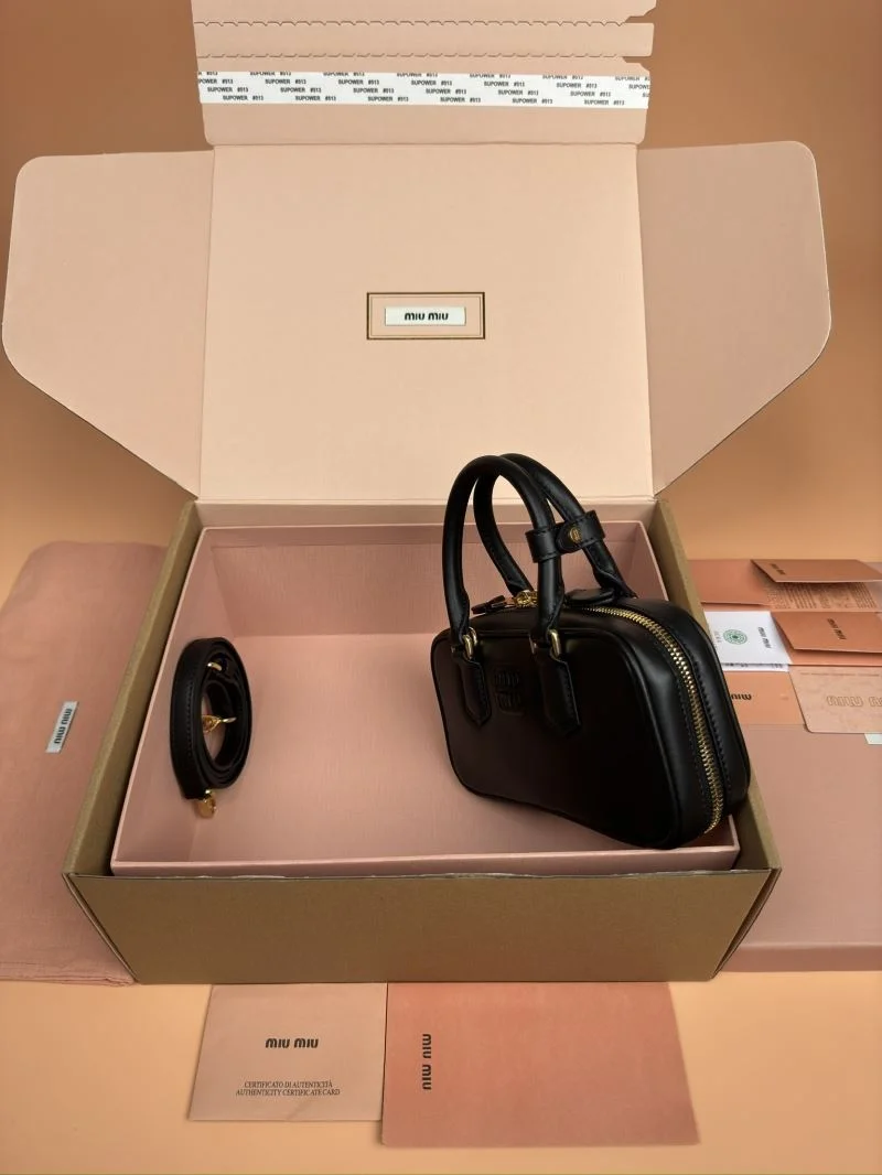 Top mirror Miu Miu Top Handle Bags