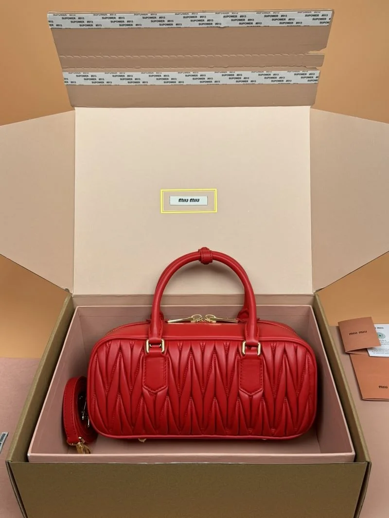 Indistinguishable Miu Miu Top Handle Bags