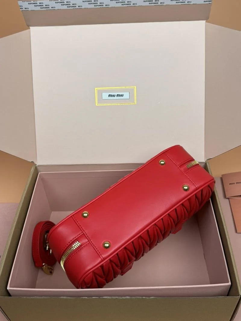 Indistinguishable Miu Miu Top Handle Bags