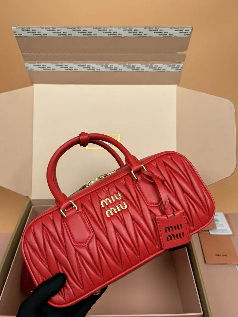 Indistinguishable Miu Miu Top Handle Bags