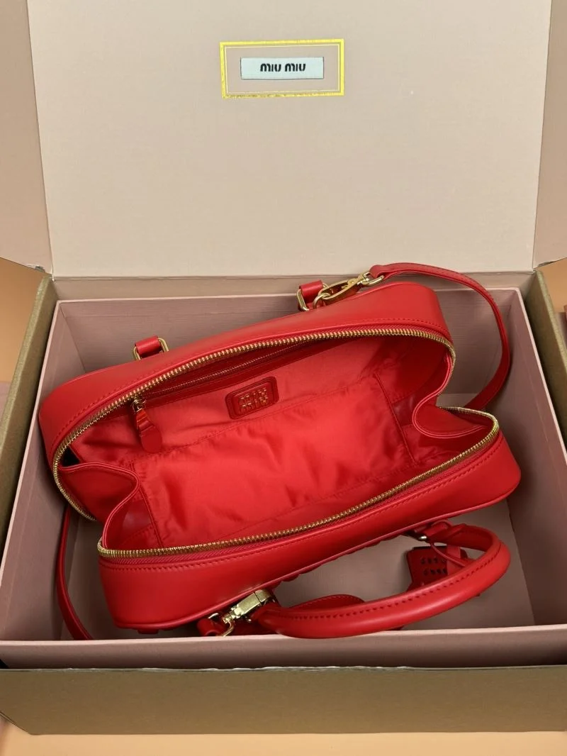 Indistinguishable Miu Miu Top Handle Bags