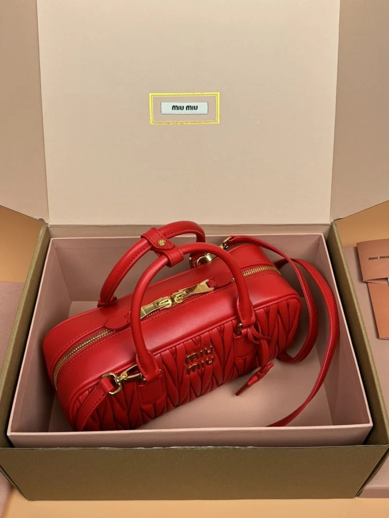 Indistinguishable Miu Miu Top Handle Bags