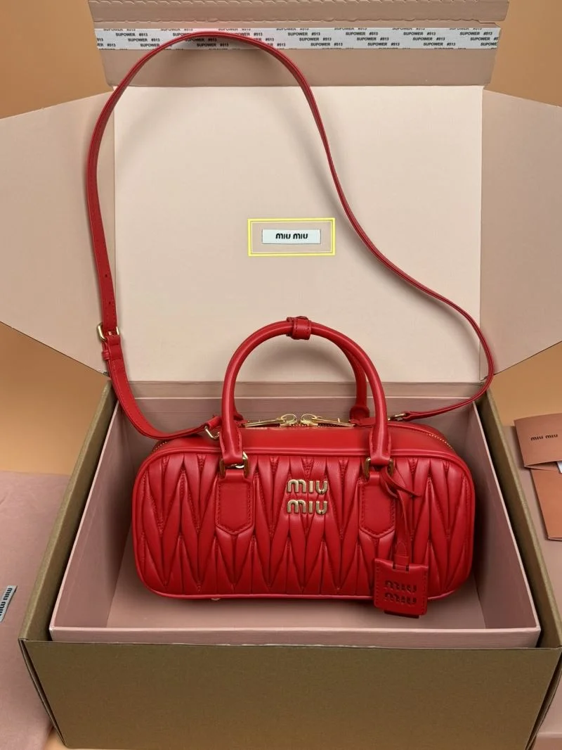 Indistinguishable Miu Miu Top Handle Bags