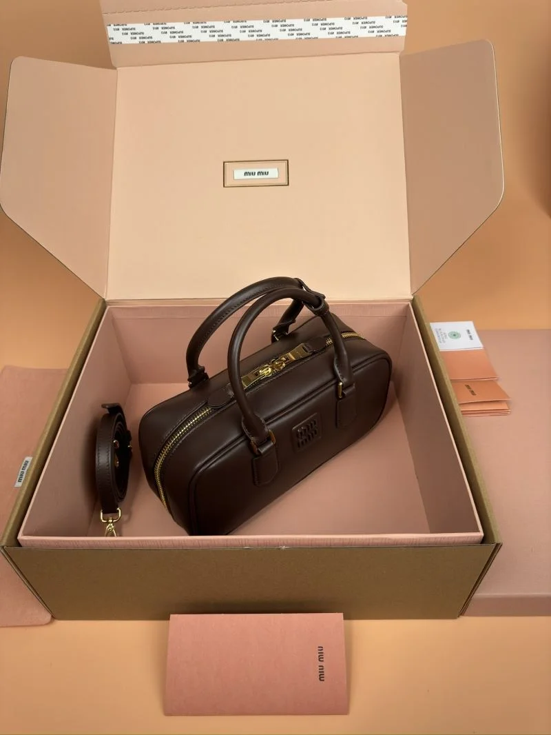 Value-priced Miu Miu Top Handle Bags