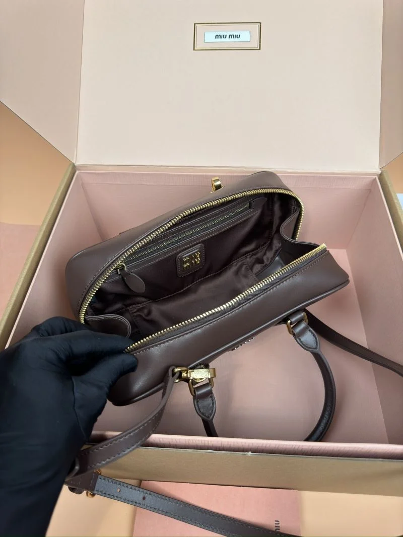 Value-priced Miu Miu Top Handle Bags
