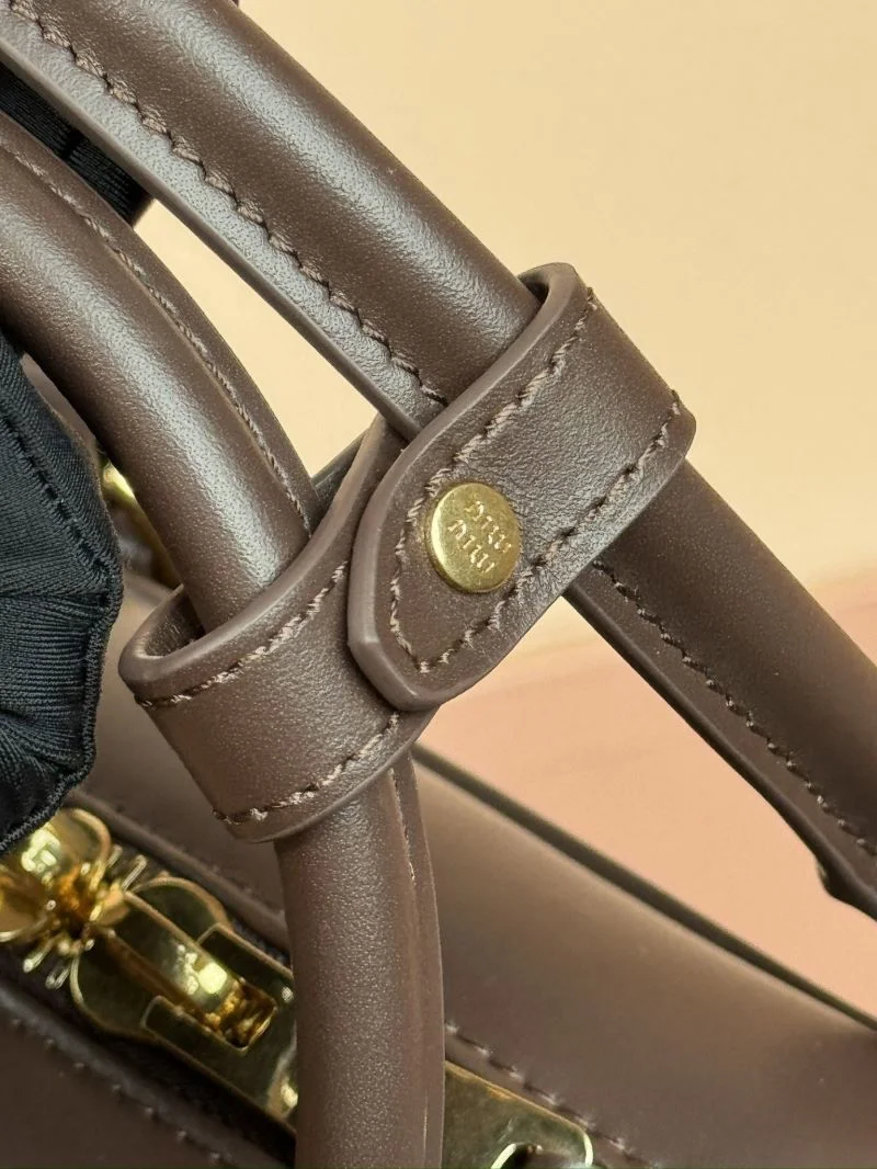 Value-priced Miu Miu Top Handle Bags