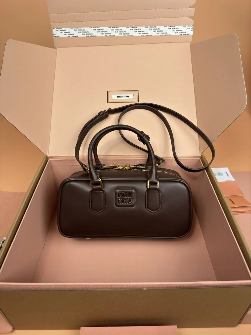 Value-priced Miu Miu Top Handle Bags