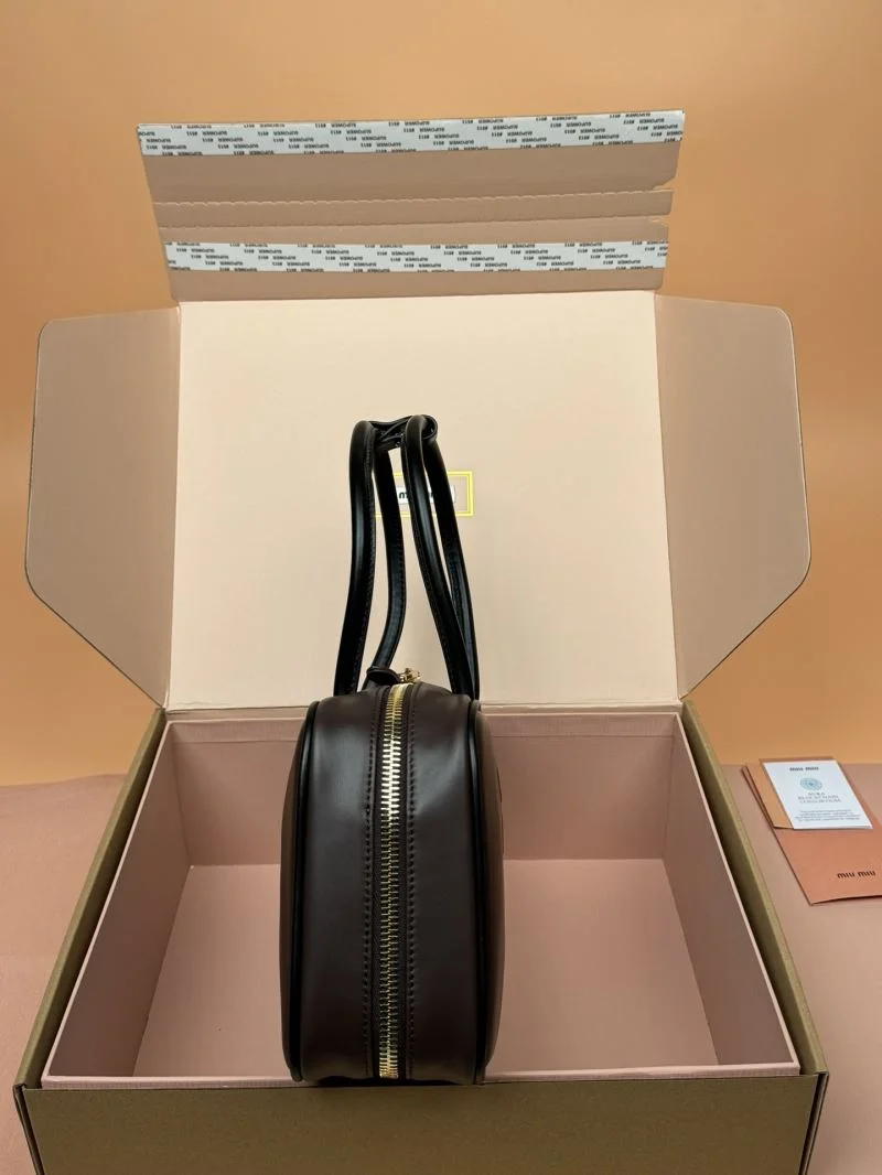 Indistinguishable Miu Miu Top Handle Bags