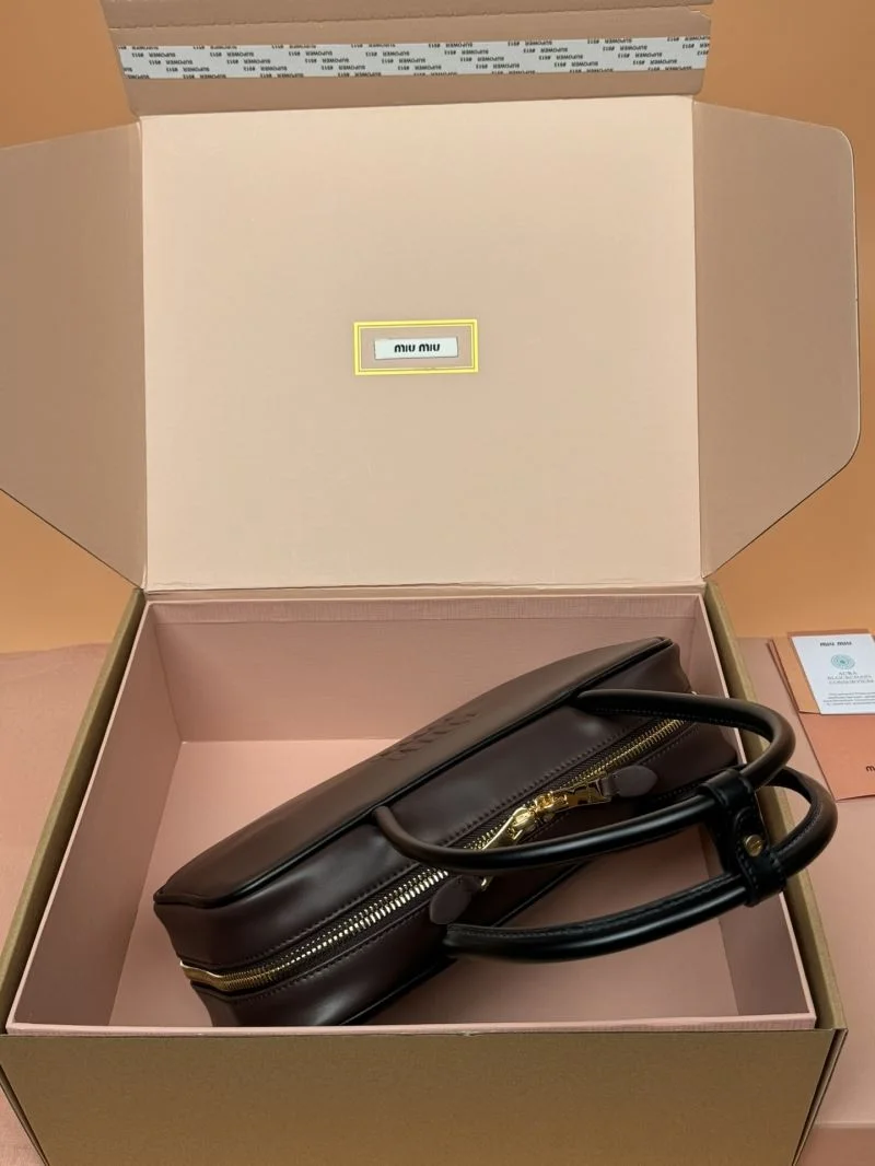 Indistinguishable Miu Miu Top Handle Bags