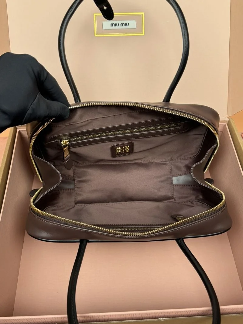 Indistinguishable Miu Miu Top Handle Bags