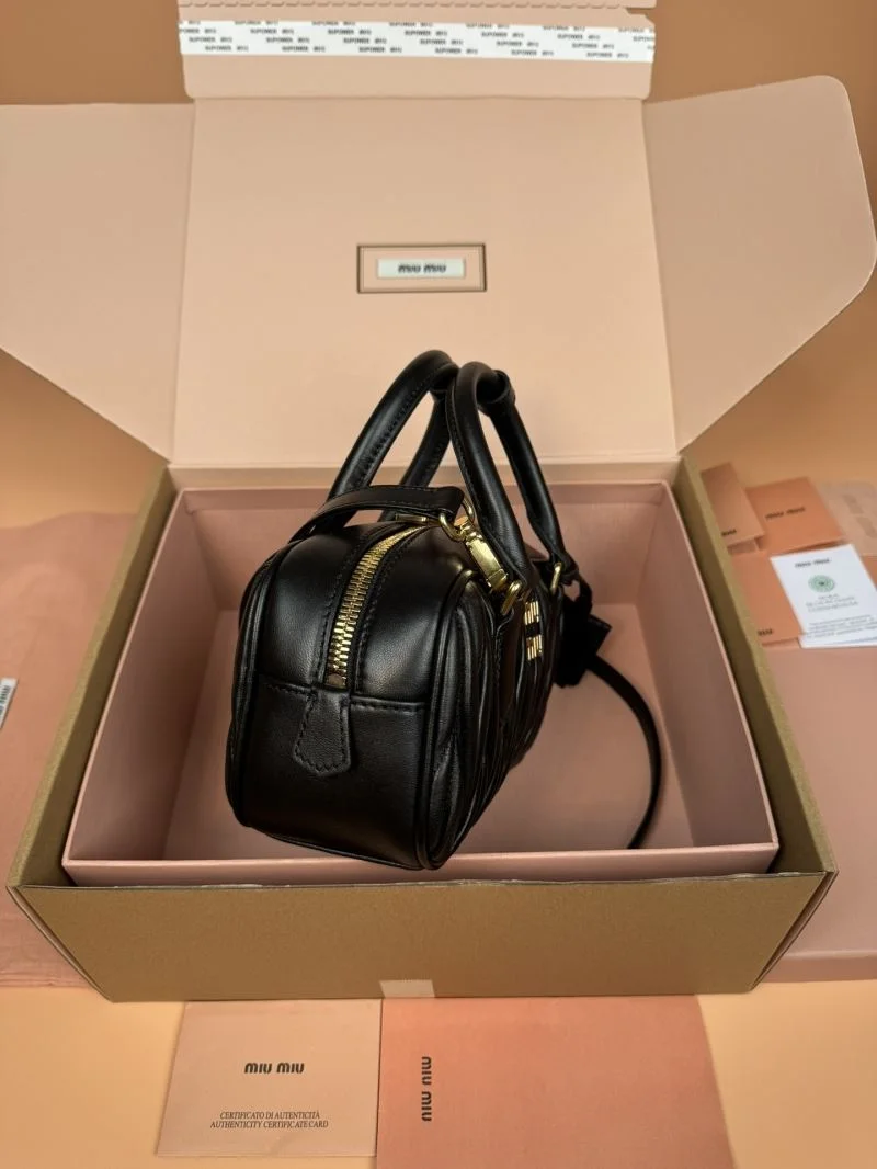 Top mirror Miu Miu Top Handle Bags