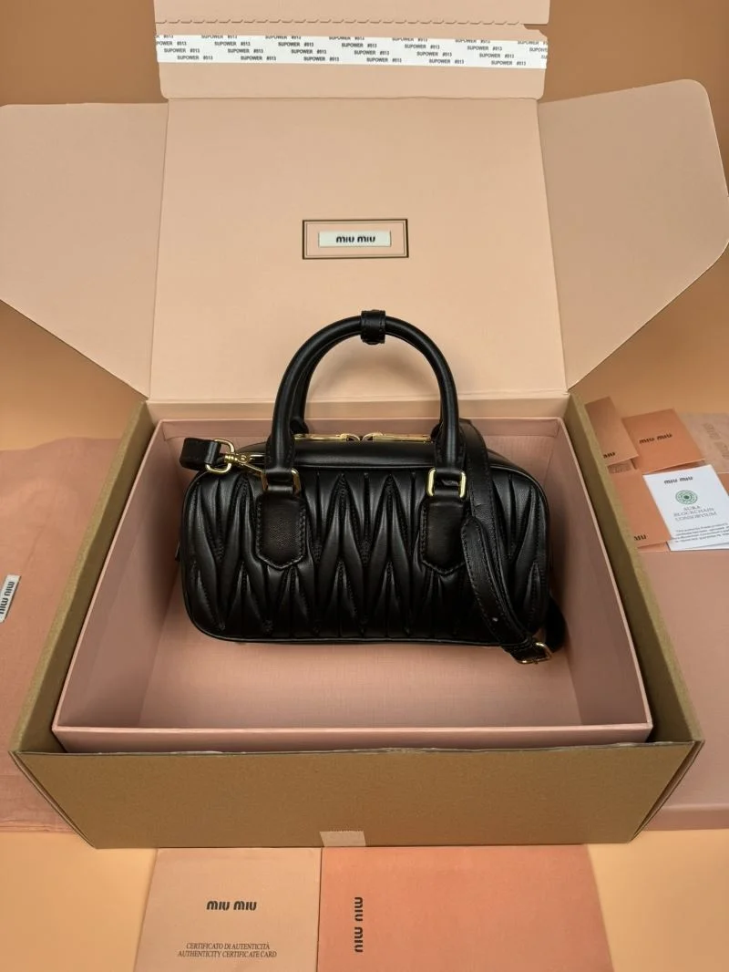 Top mirror Miu Miu Top Handle Bags