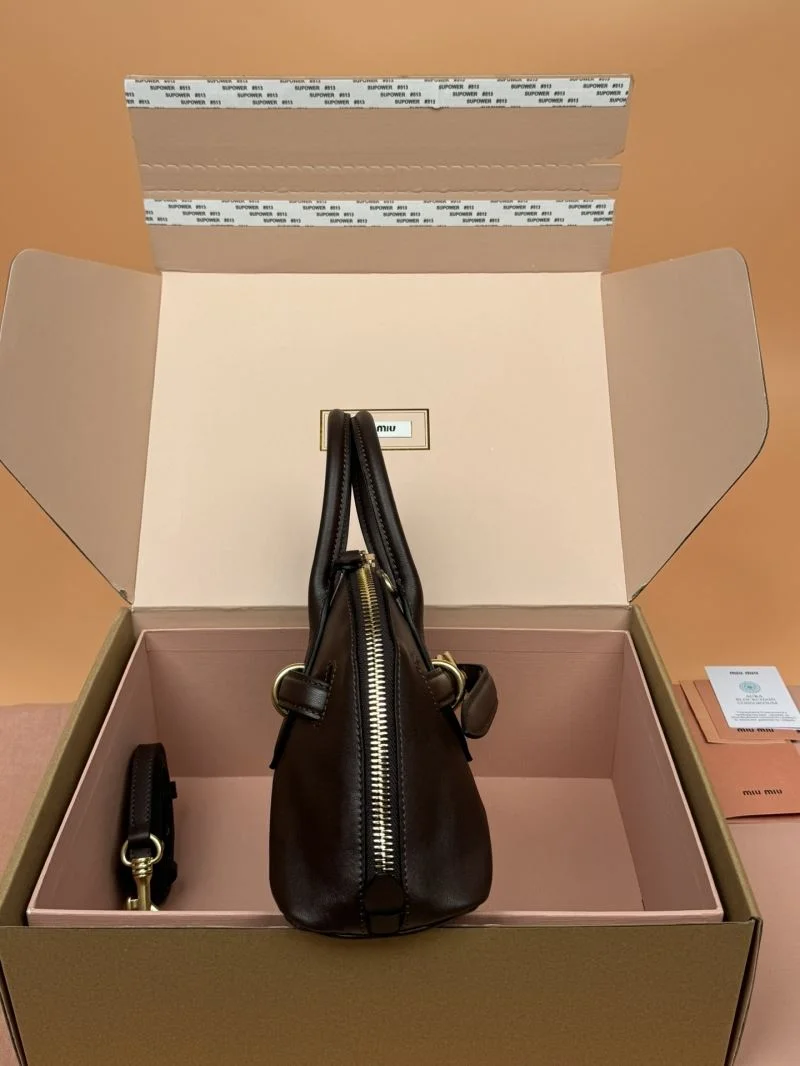 Indistinguishable Miu Miu Top Handle Bags