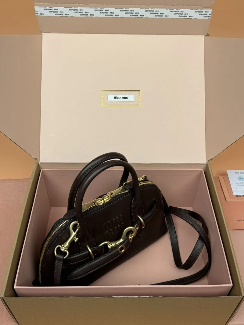 Indistinguishable Miu Miu Top Handle Bags