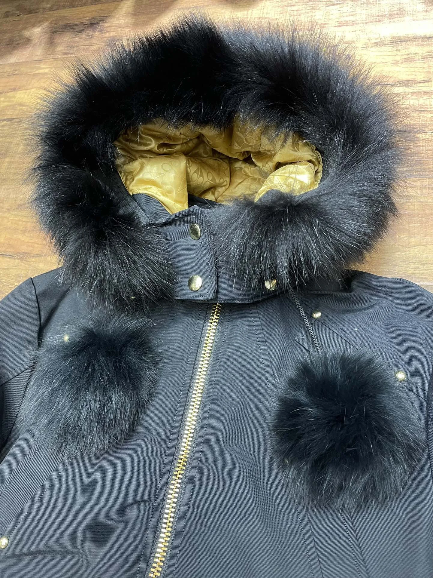 Budget-friendly Moose Knuckles Down Jackets