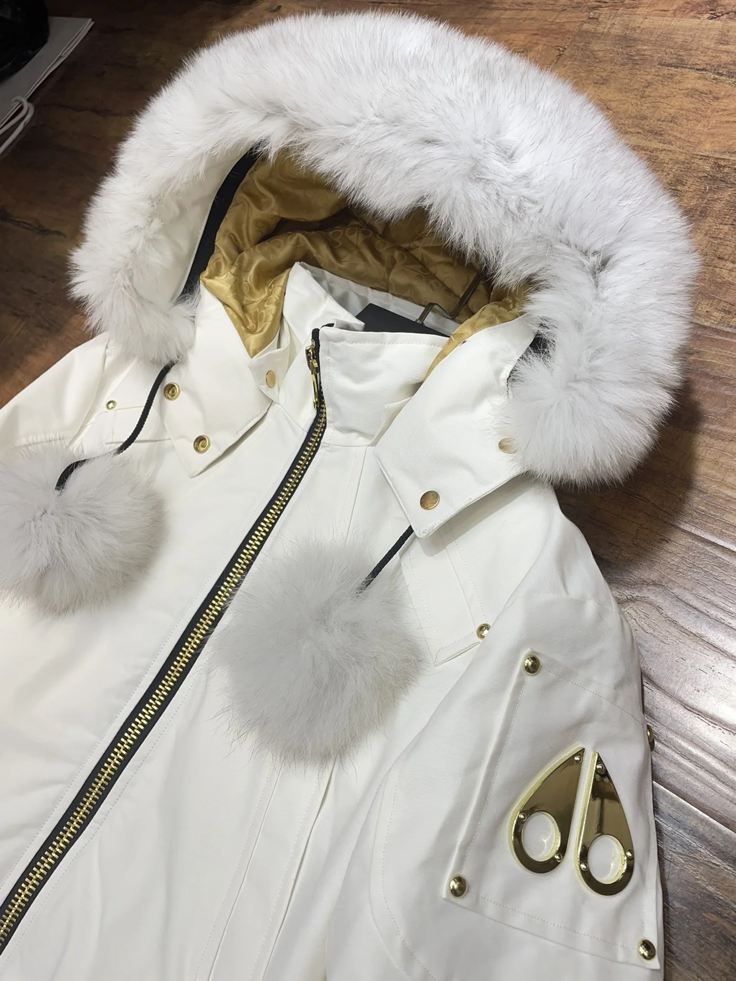 Budget-friendly Moose Knuckles Down Jackets