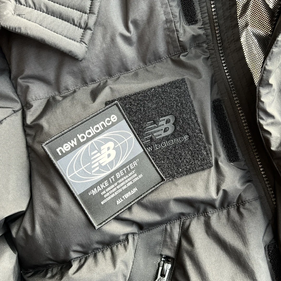 Top mirror New Balance Down Jackets