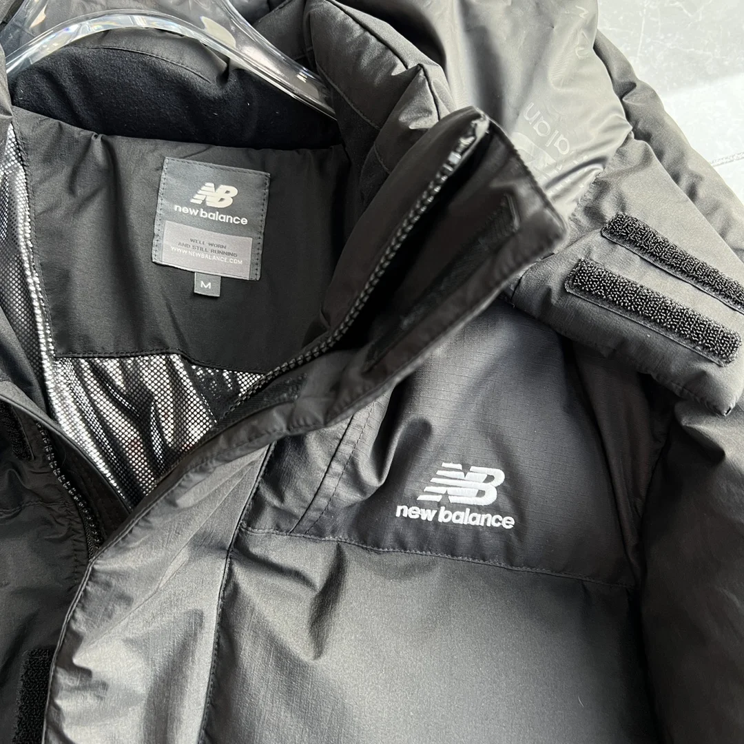 Top mirror New Balance Down Jackets