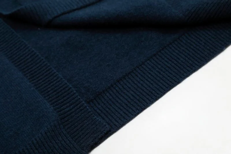 Indistinguishable Polo Sweaters