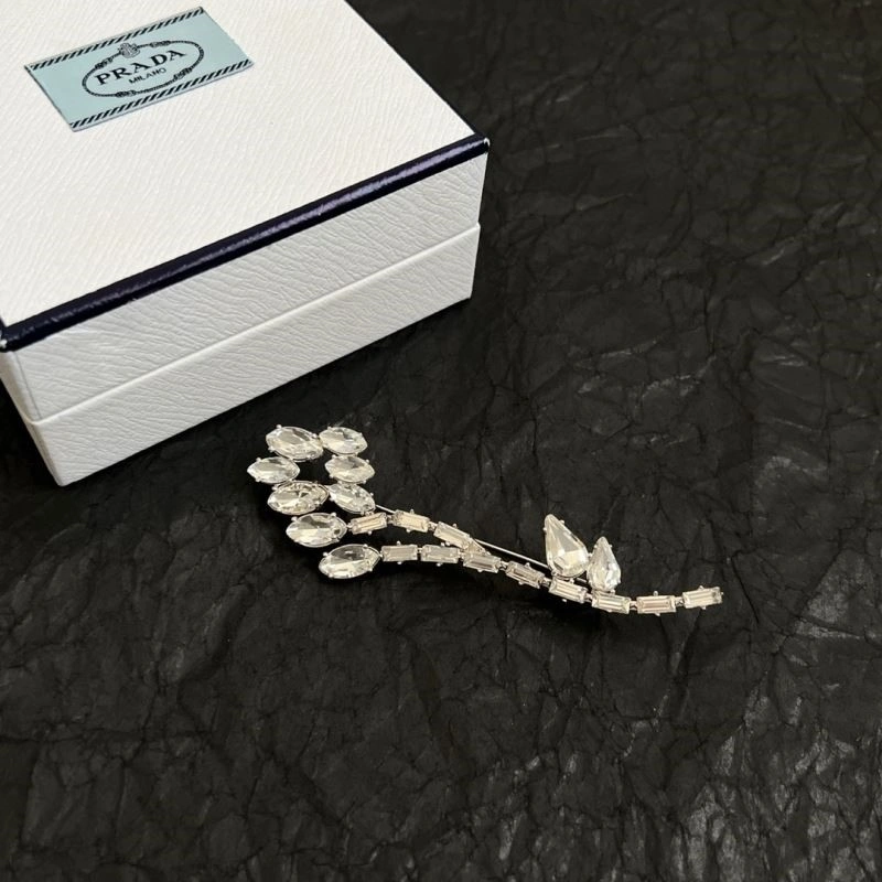 Low-cost Prada Brooches