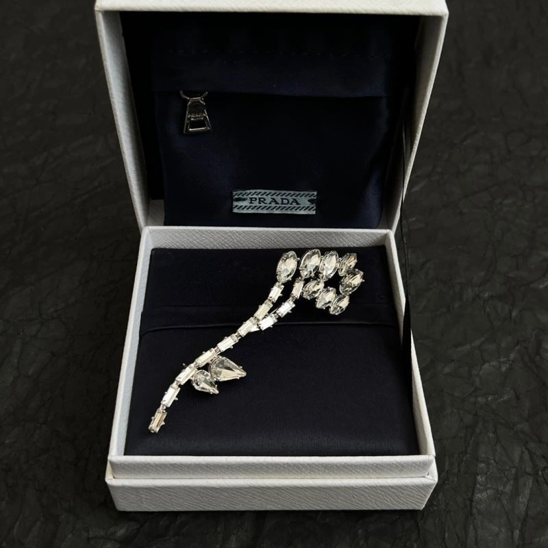 Low-cost Prada Brooches