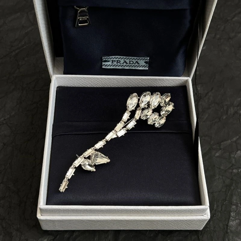 Low-cost Prada Brooches