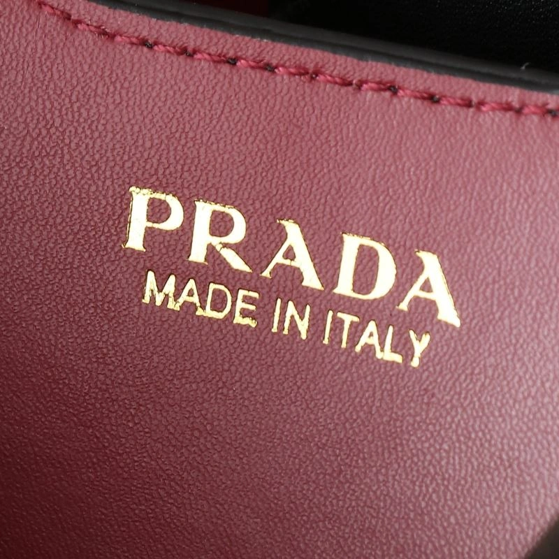 Indistinguishable Prada Bucket Bags