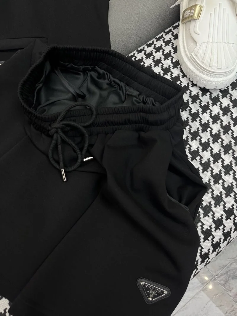 Indistinguishable Prada Dress Suits
