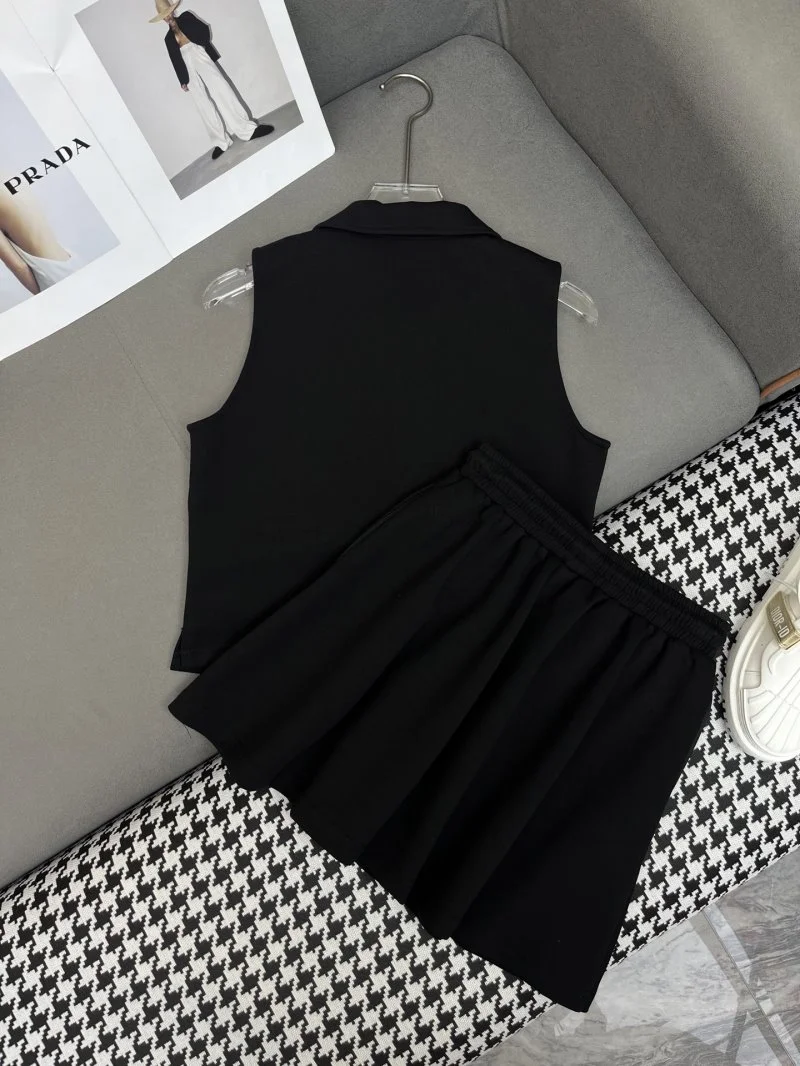 Indistinguishable Prada Dress Suits