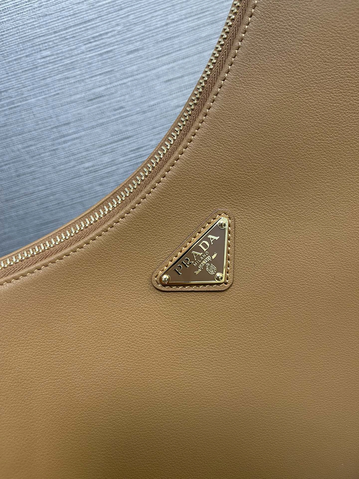 Brand-authenticated Prada Hobo Bags