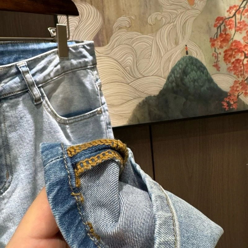Indistinguishable Prada Jeans