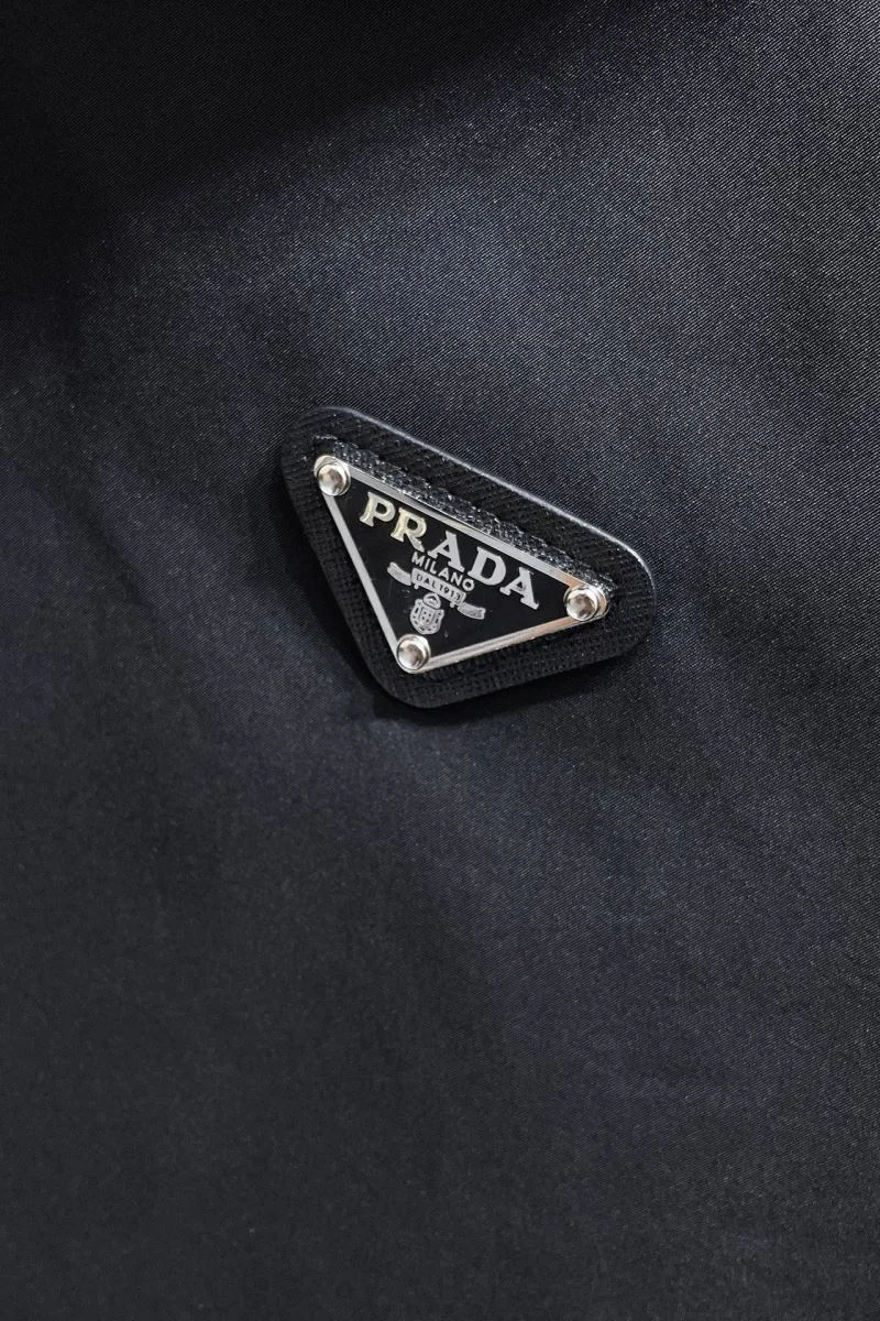 Reasonably priced Prada Outwear