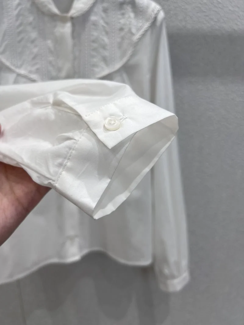 Indistinguishable Prada Shirts