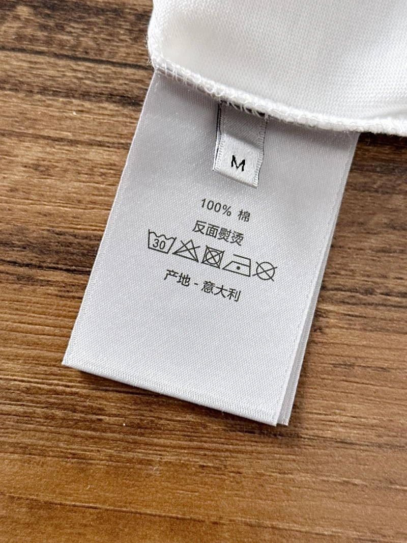 Indistinguishable Prada T-Shirts