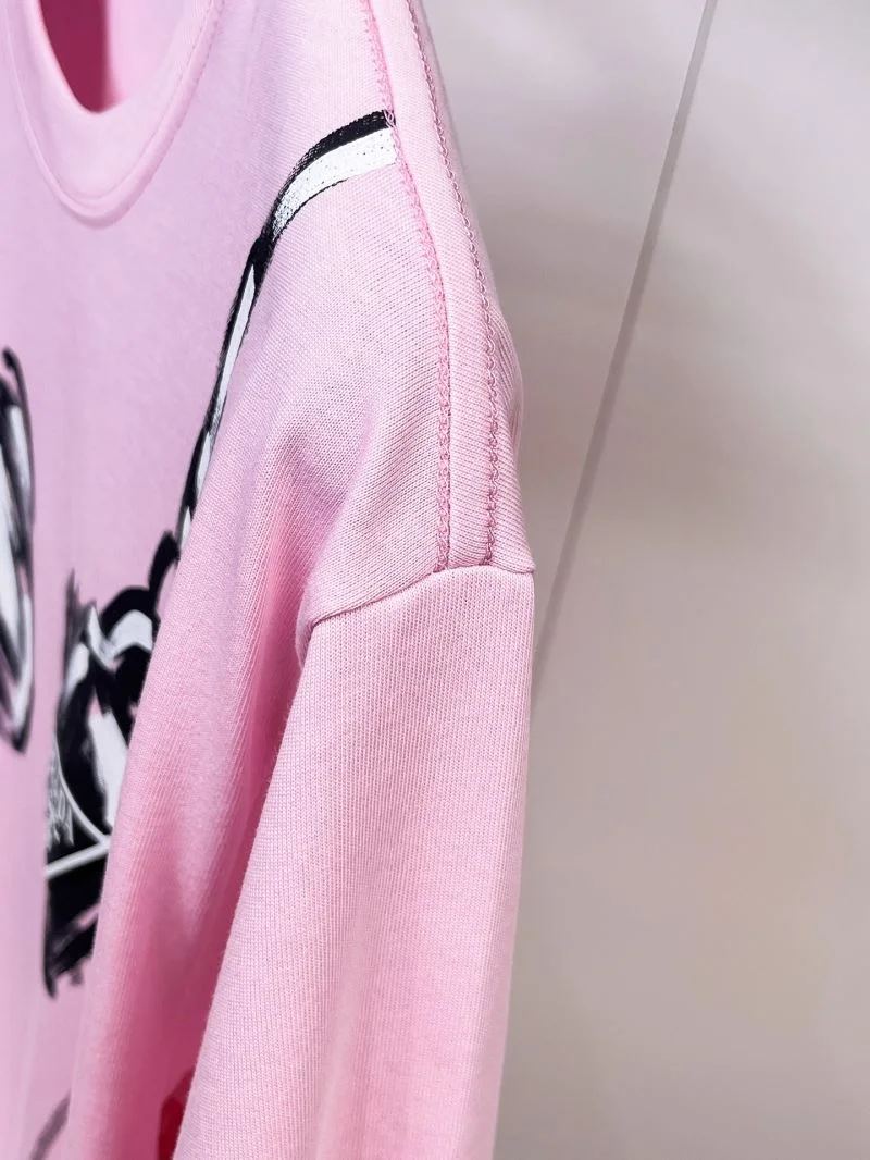 Indistinguishable Prada T-Shirts
