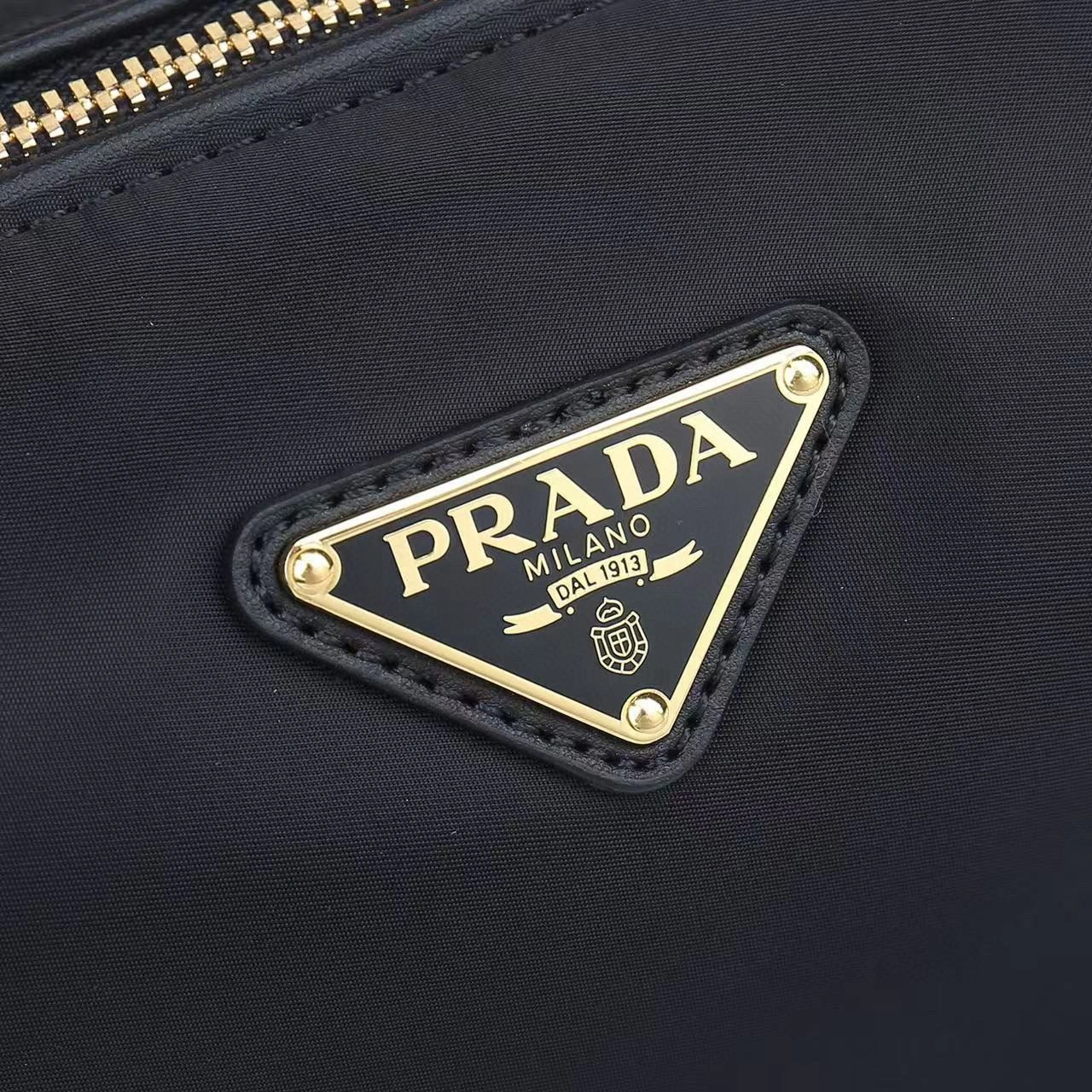 Indistinguishable Prada Top Handle Bags