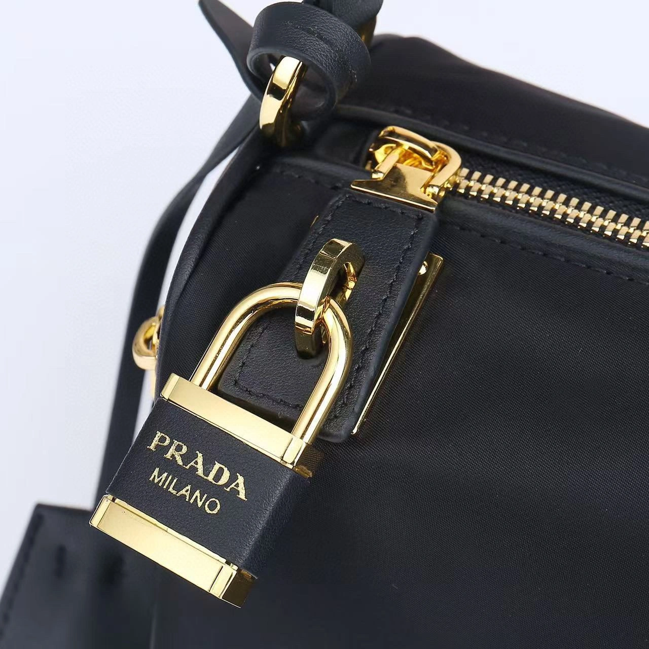 Indistinguishable Prada Top Handle Bags