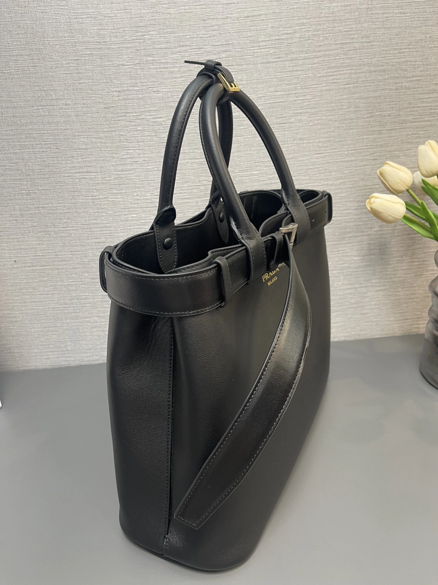 Brand-authenticated Prada Top Handle Bags